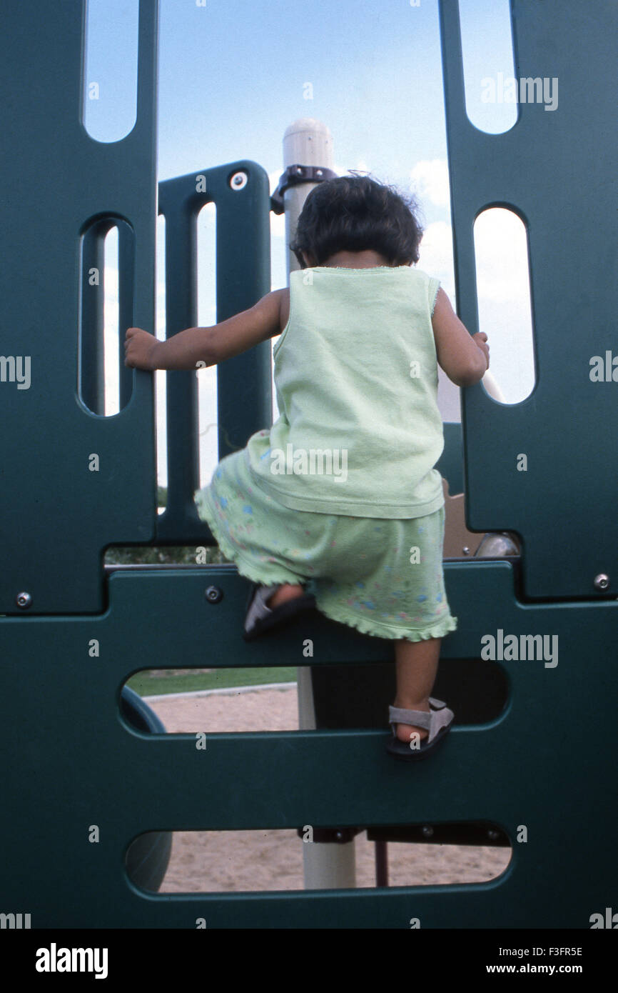 Child climbing steps Stock Photo - Alamy