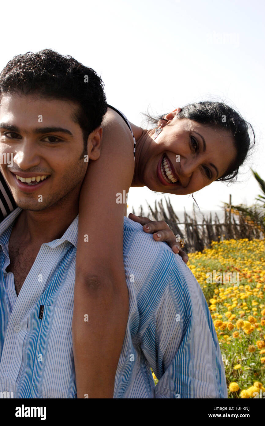 Guy Carrying Girlfriend Over Shoulder