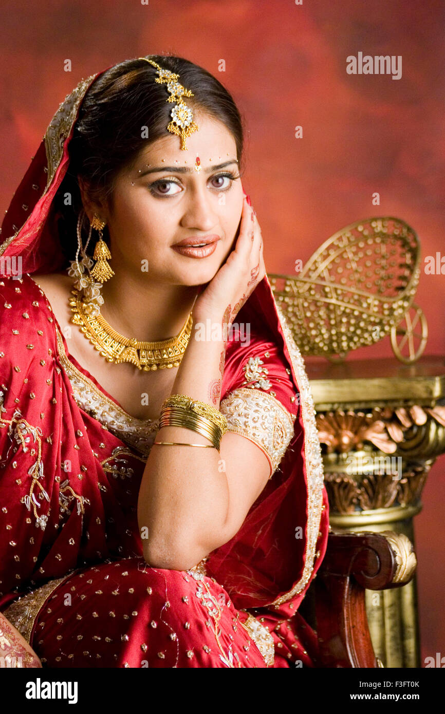 Indian bride showing henna tattoos on hand in marriage ceremony MR#729D ...