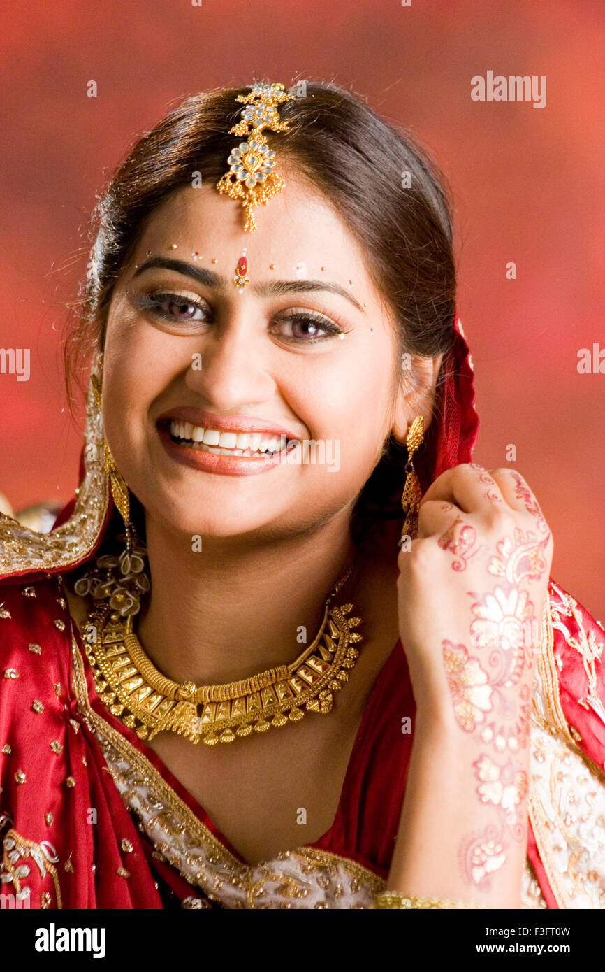 Portrait of Indian bride in traditional wearing for marriage ceremony ...