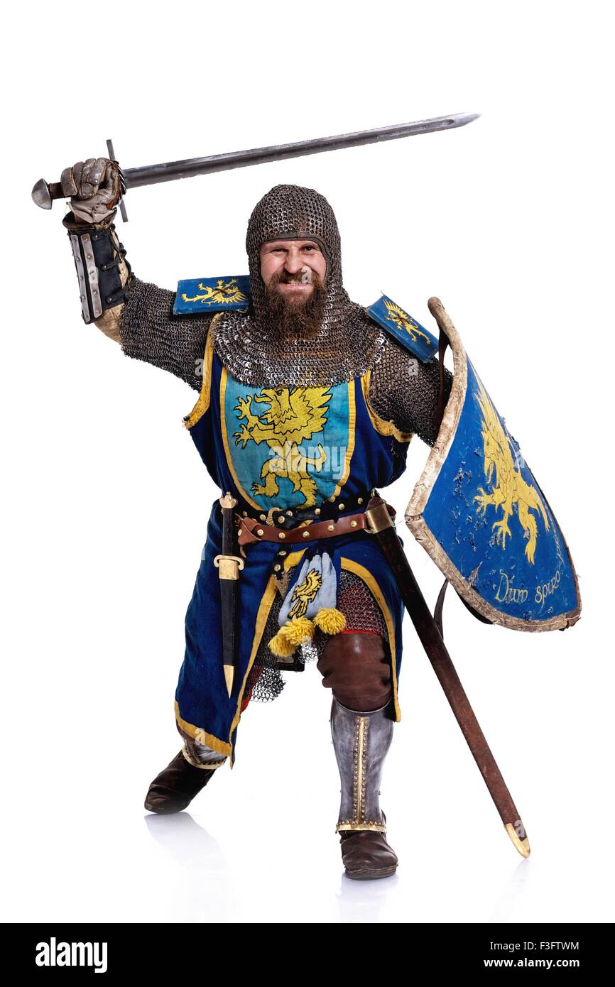 Medieval knight in attack position Stock Photo - Alamy