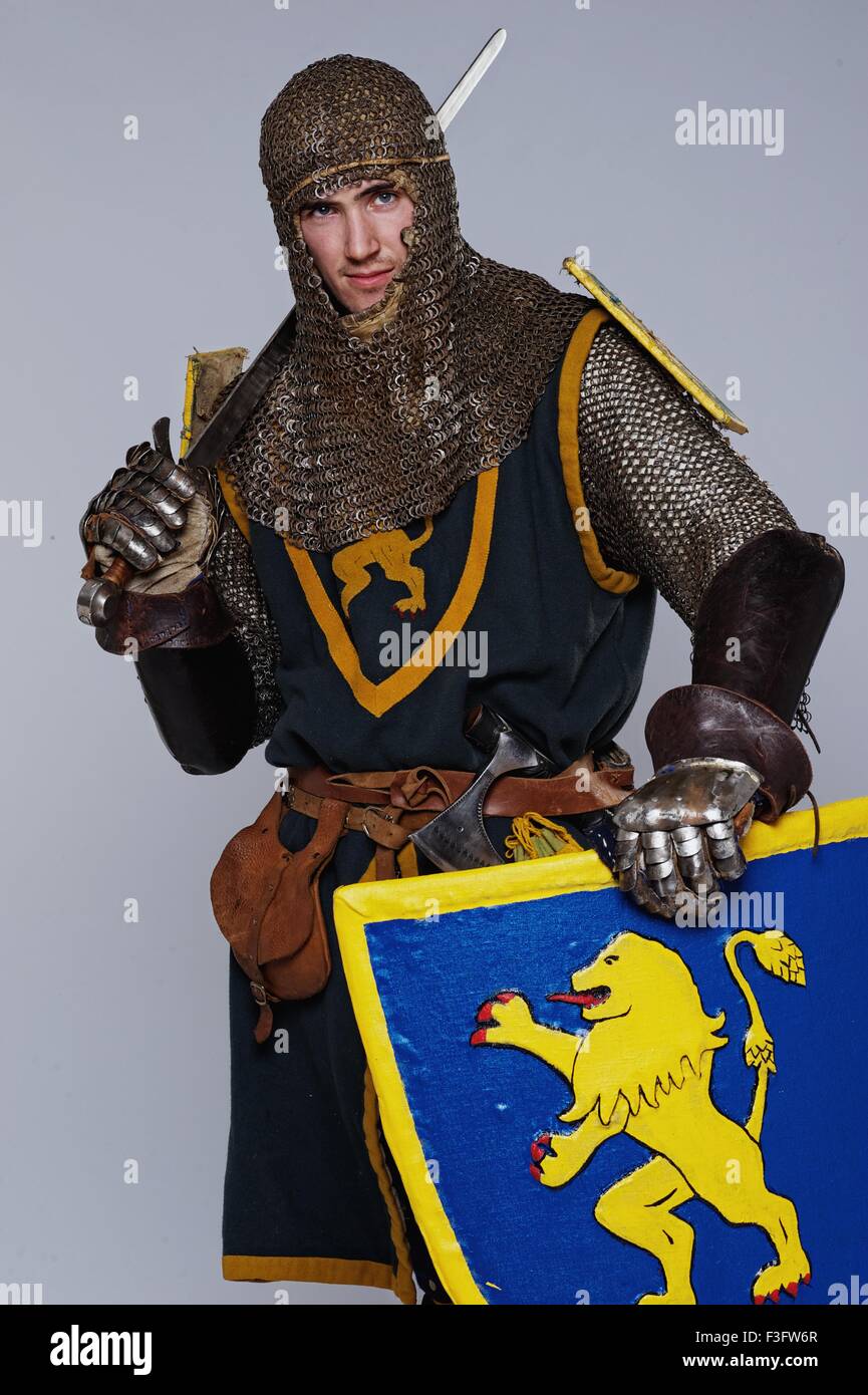 Medieval knight isolated on grey background Stock Photo - Alamy