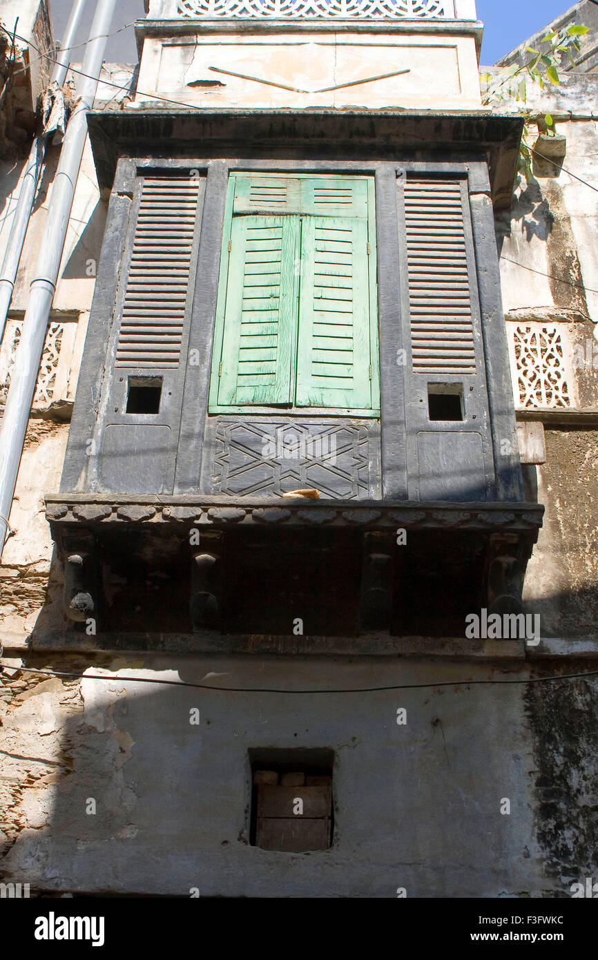 Old closed wooden balcony cantilever window ; Udaipur ; Rajasthan ...