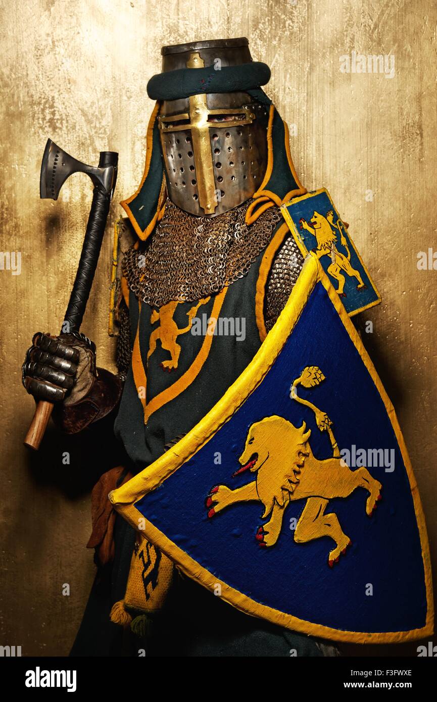 Medieval knight on golden background Stock Photo - Alamy