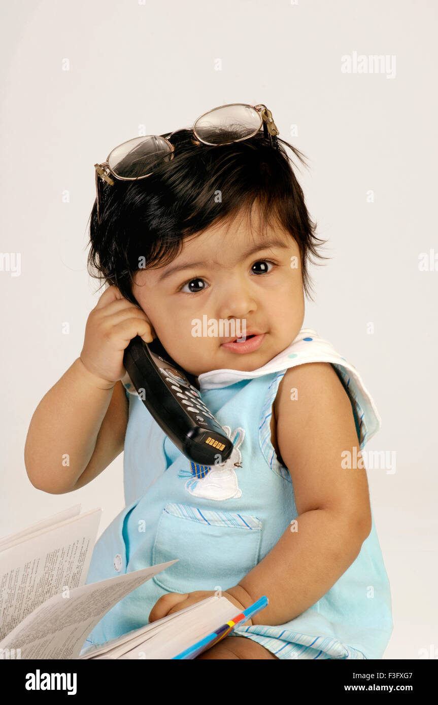 Child talking on mobile phone ; MR Stock Photo - Alamy