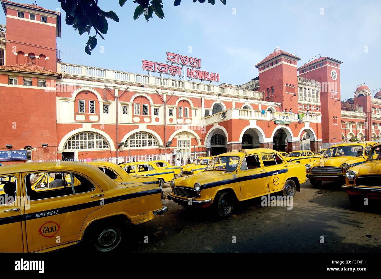 Howrah railway station building and taxi stand ; Calcutta now Kolkata ...