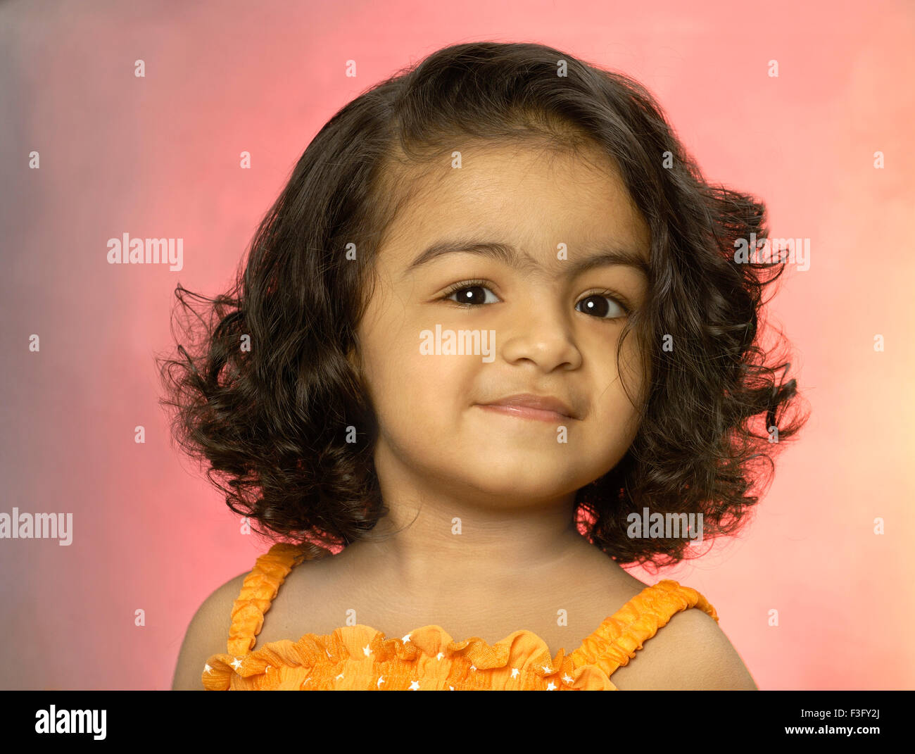 girl child looking at camera Stock Photo - Alamy