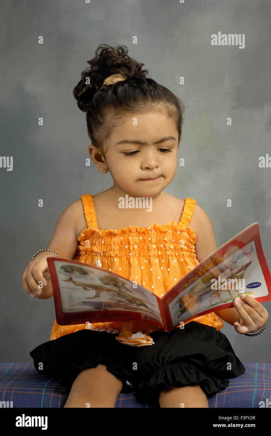 girl child reading Stock Photo - Alamy