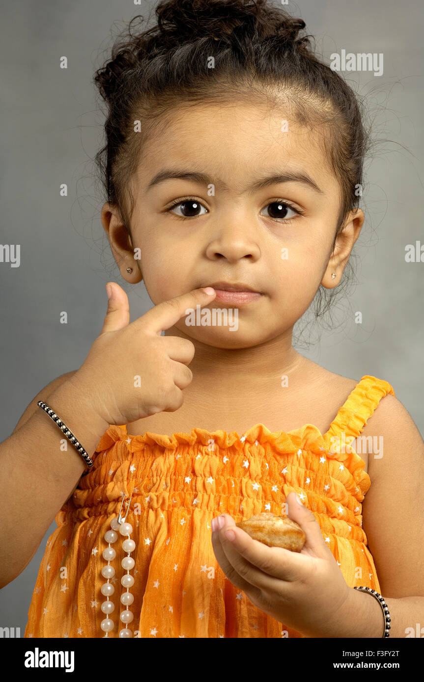 girl child looking at camera Stock Photo - Alamy