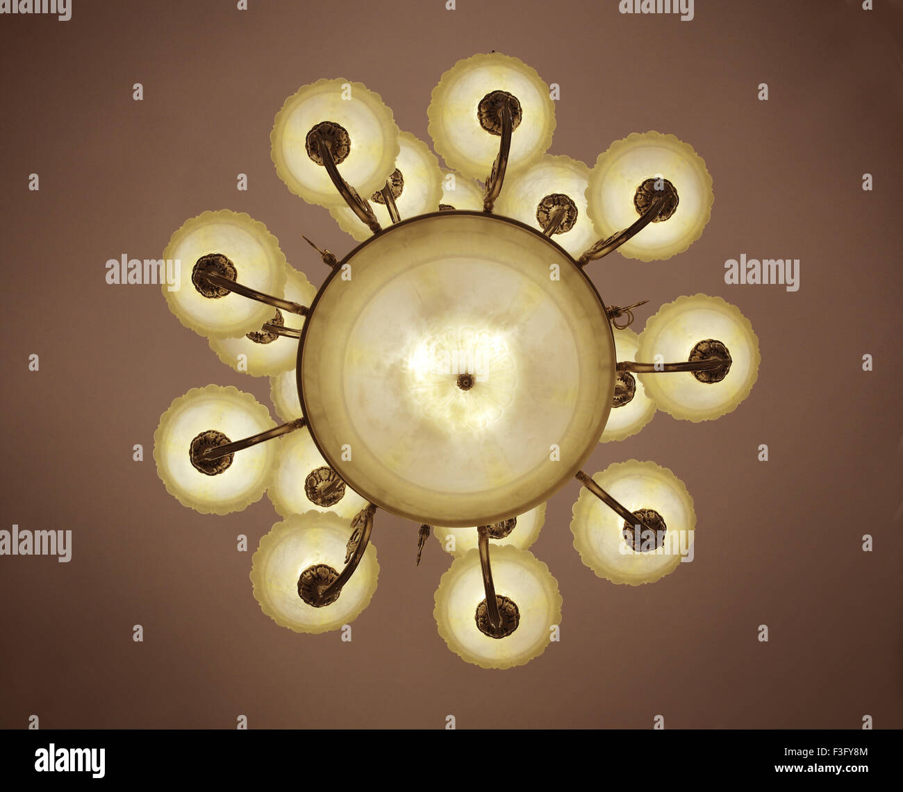 Chandelier with multiple lamps hanging from the ceiling Stock Photo - Alamy