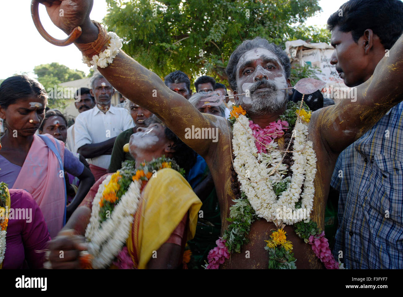 Devotees trance dances ecstasy appearance divine radiance face Vaikasi ...