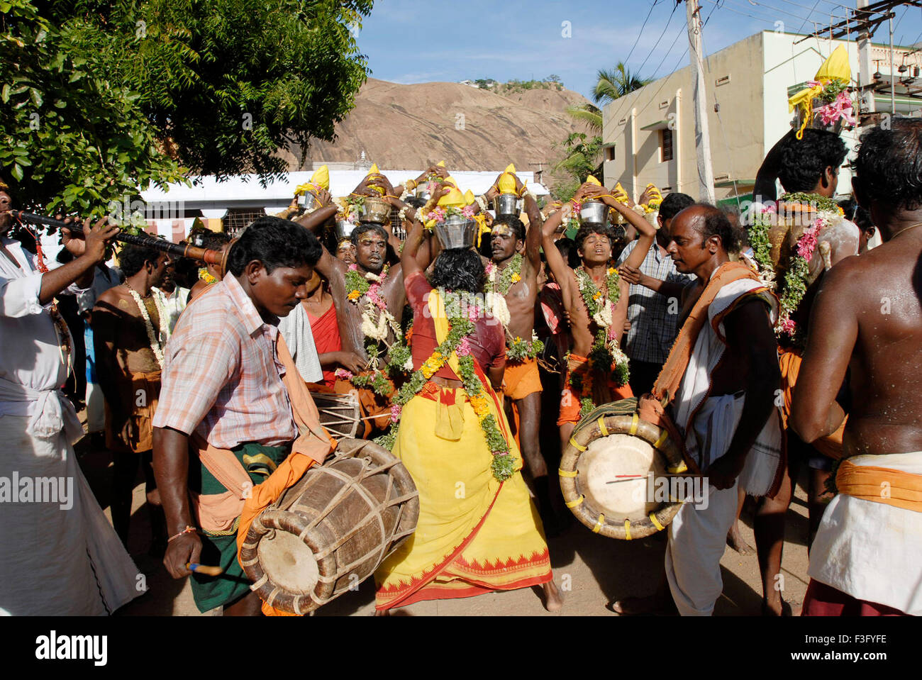 Procession of devotees with drummers carrying milk pots Paal kudam for ...