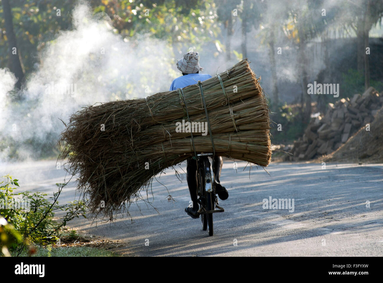 Man carrying heavy load on back hi-res stock photography and images - Alamy