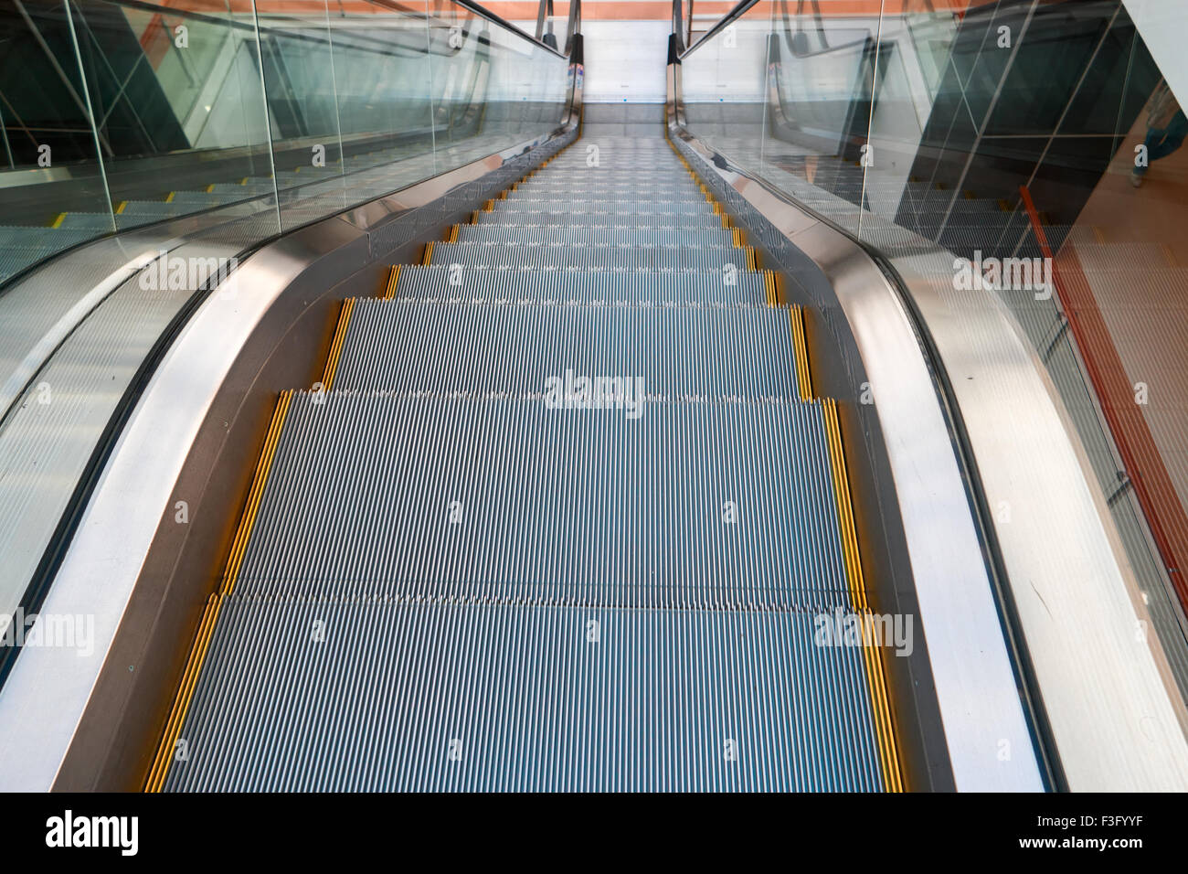 Moving up escalator in modern hi-res stock photography and images - Alamy