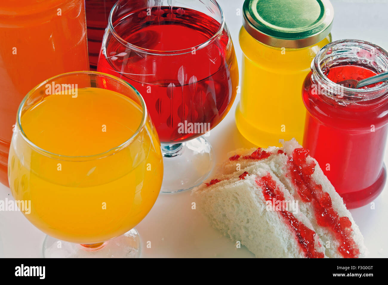 Colourful drink and jam sandwich Stock Photo - Alamy