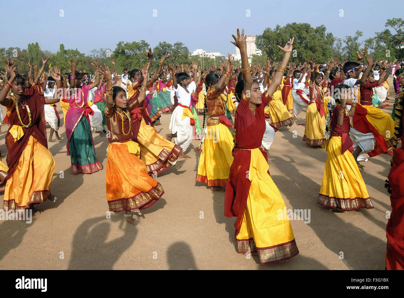 Children performing group dances in festive program ; Kerala ; India ...
