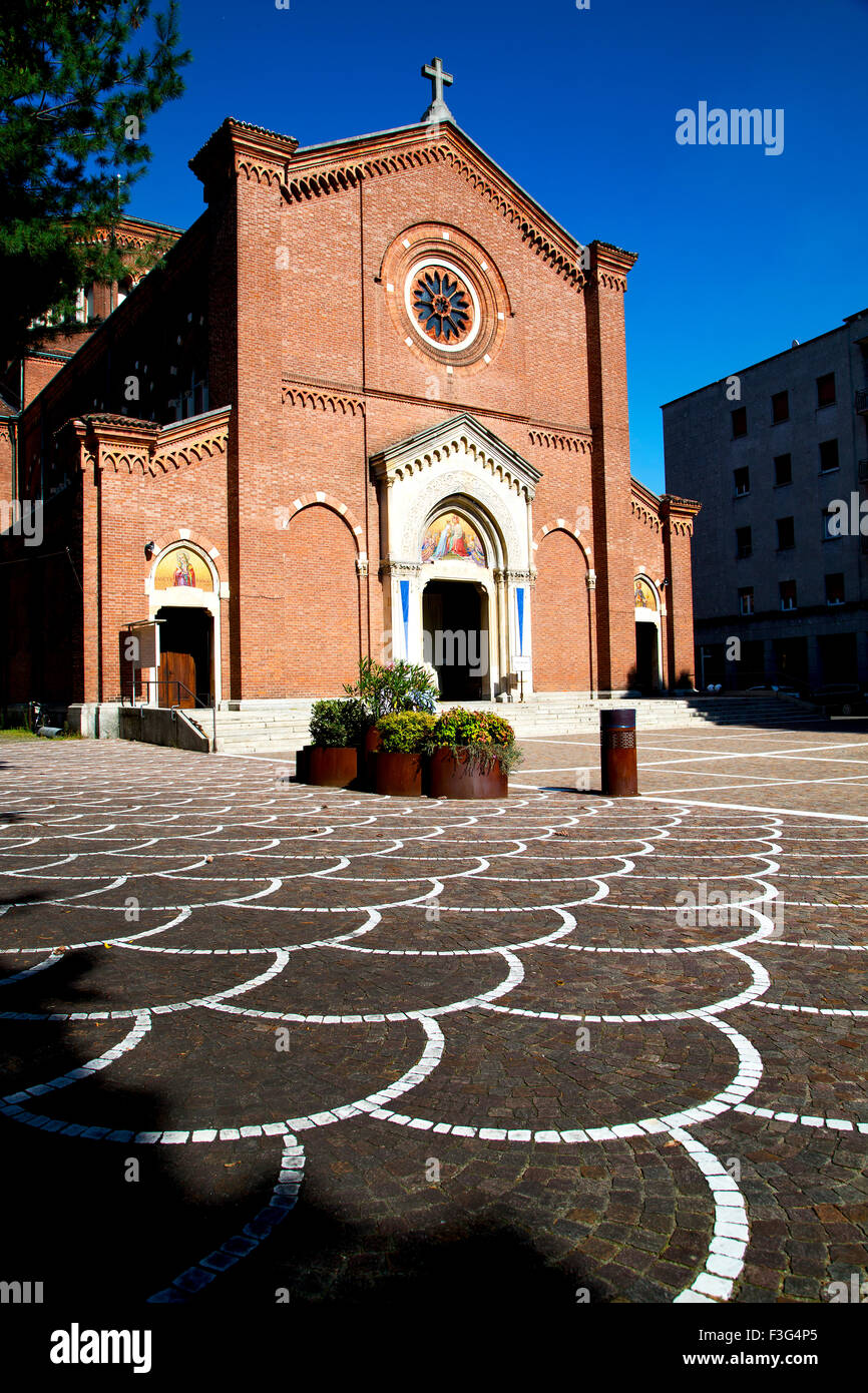 lombardy in the castellanza old church closed brick tower sidewalk ...