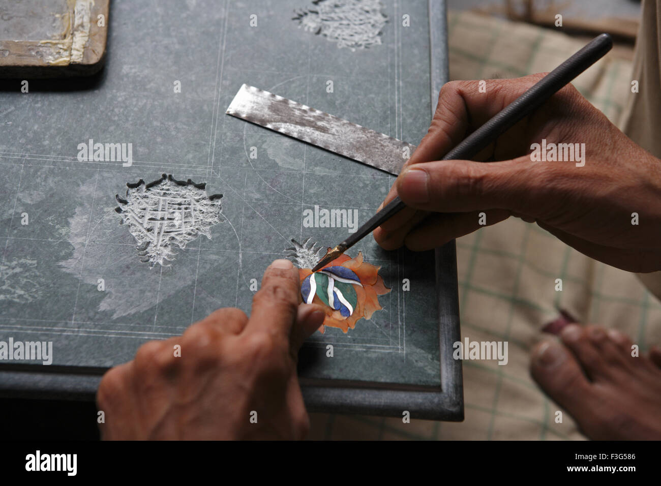 Man doing marble inlay work ; Agra; Uttar Pradesh; India Stock Photo ...