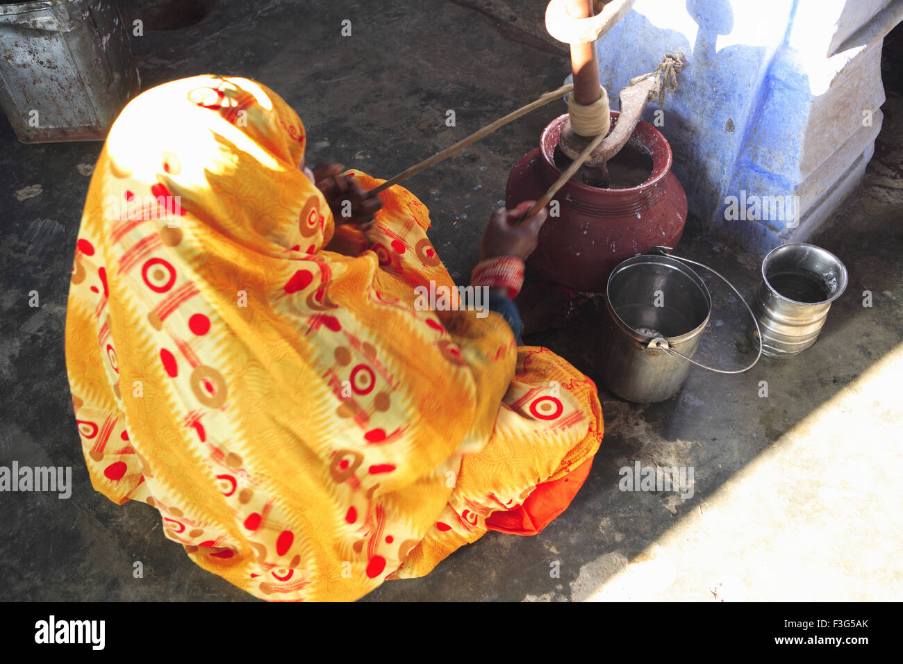 Churning woman hi-res stock photography and images - Alamy