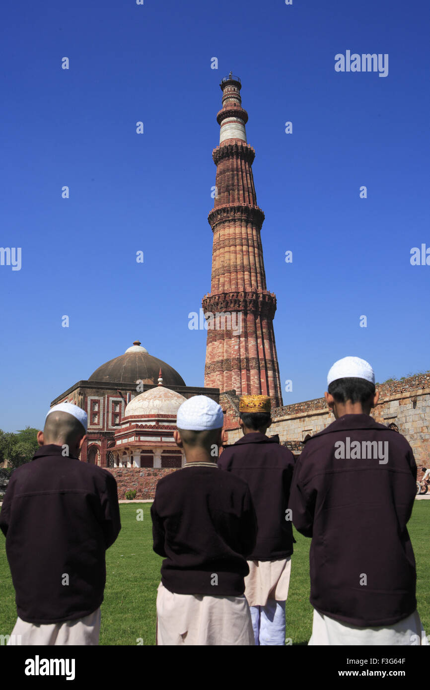 Children doing Namaz Alai Darwaza Imam Zamin tomb Qutab Minar red ...