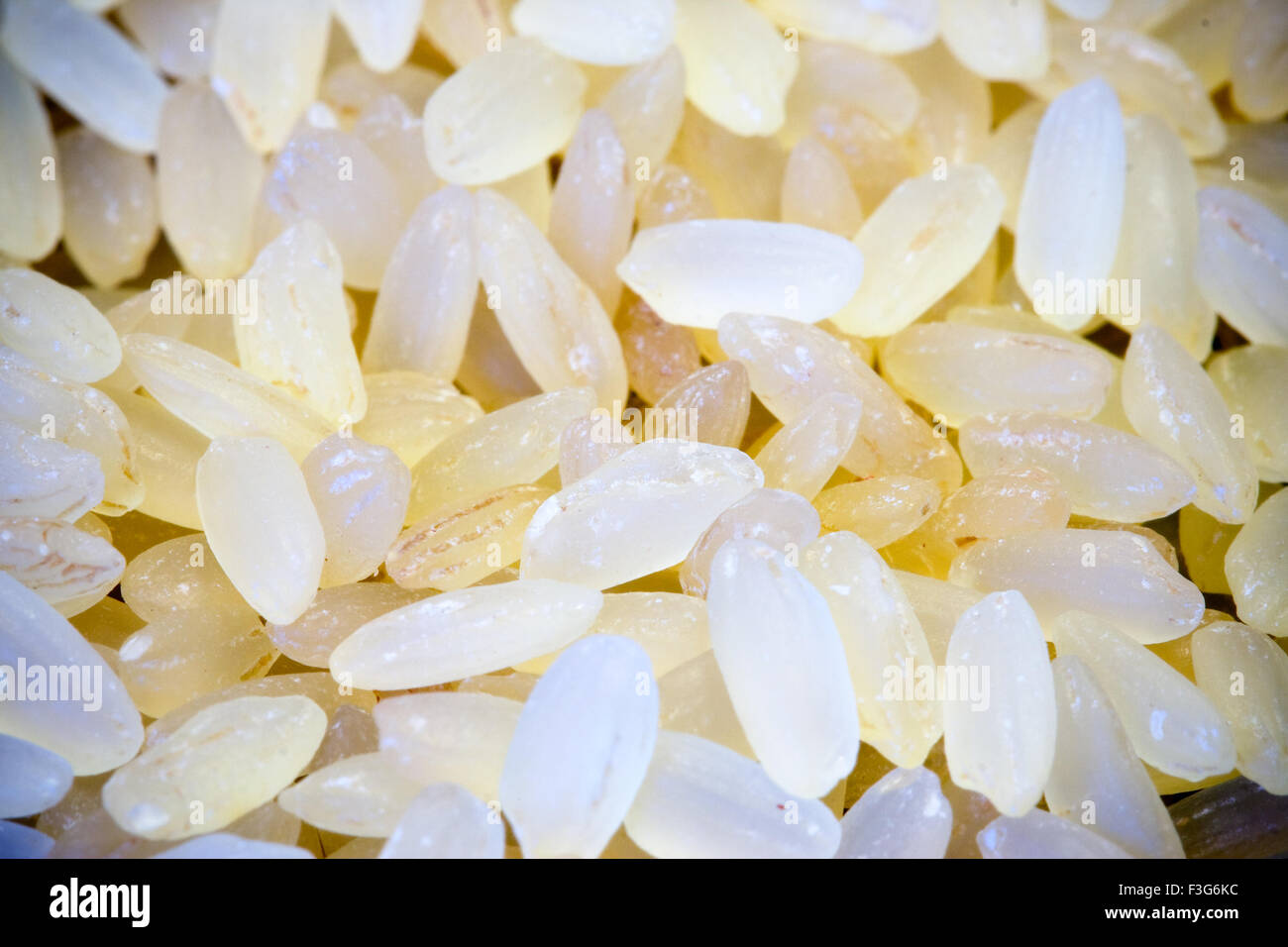 Rice on black background close up Stock Photo - Alamy