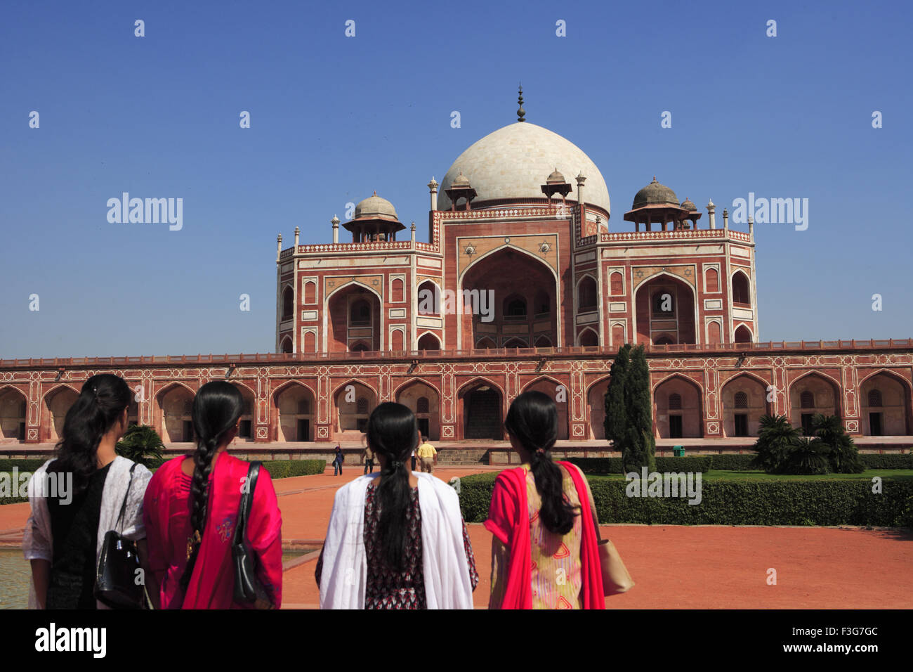 Indian girls watching Humayuns tomb 1570 red sandstone and white marble ...