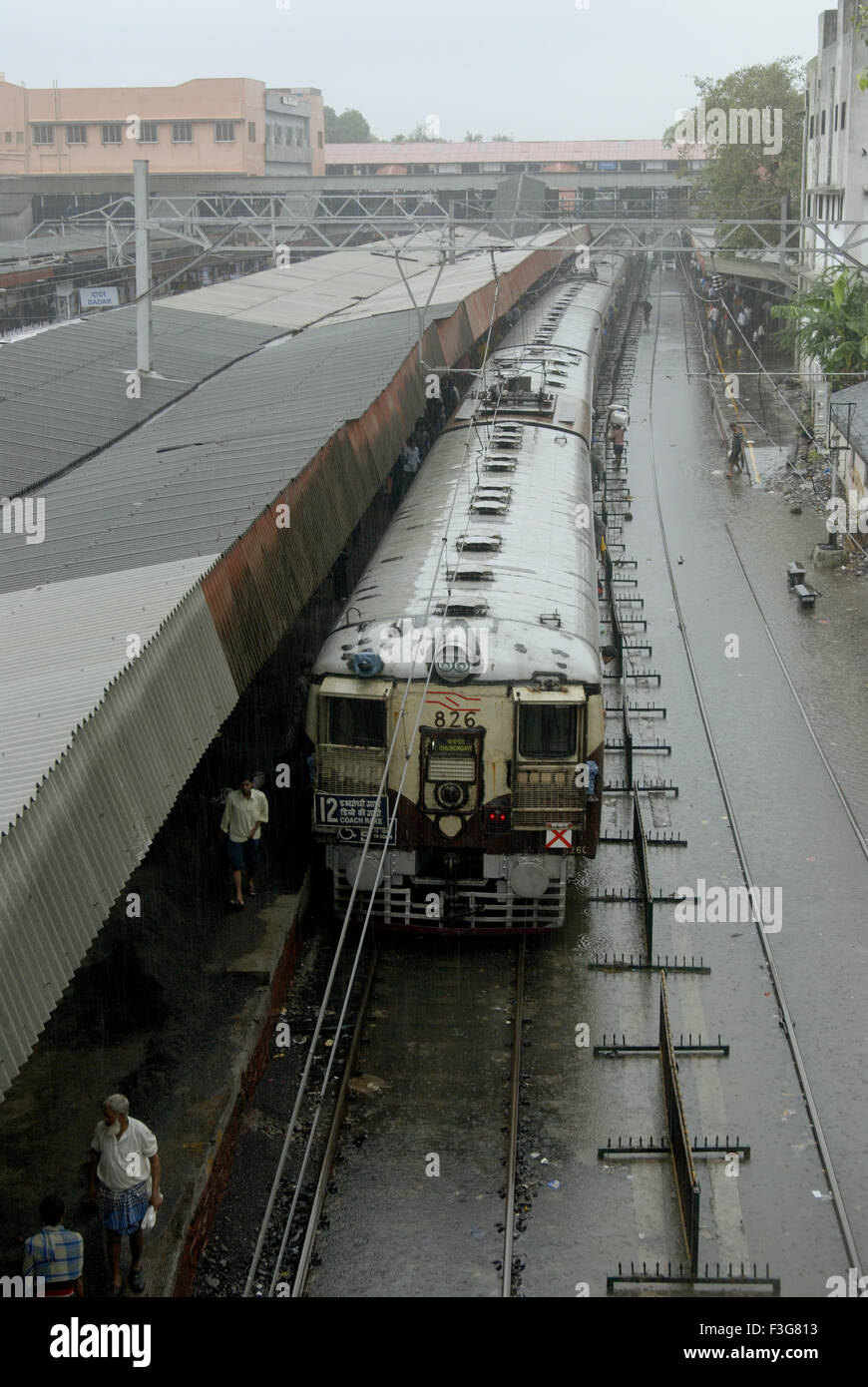 Local train at flooded railway tracks at western railway ; Dadar ; Mumbai Bombay ; Maharashtra ...