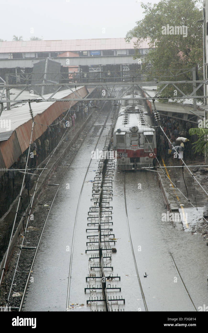 Local train at flooded railway tracks at western railway ; Dadar ...