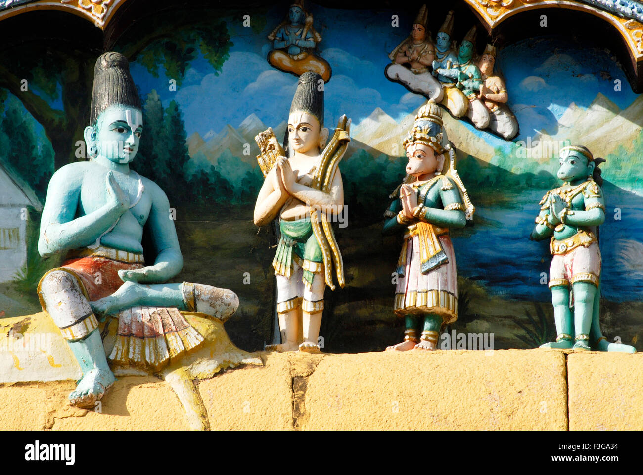 painted richly decorated stucco figures of Ramayana period on facade ...