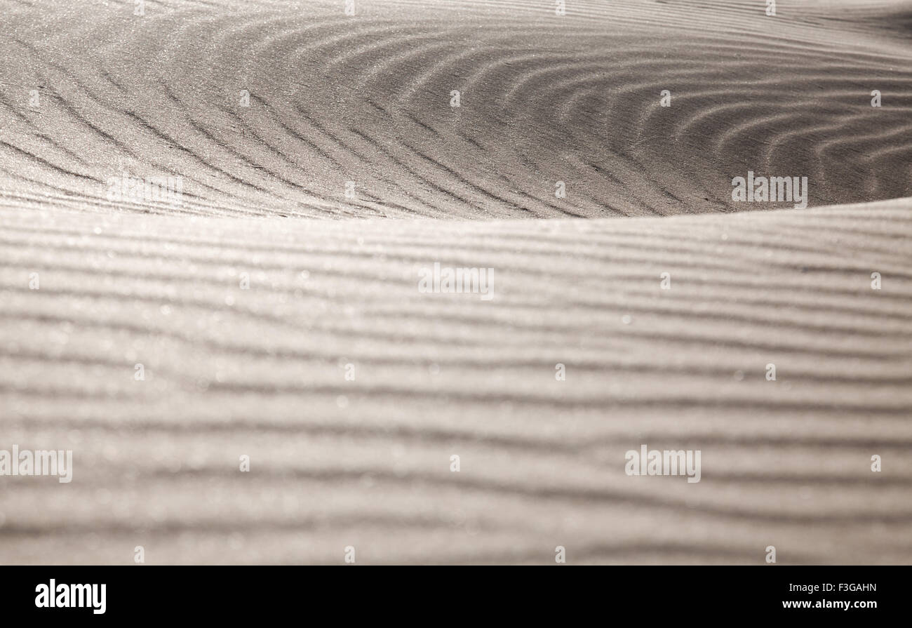 sand and wind pattern on dune surface natural background Stock Photo ...