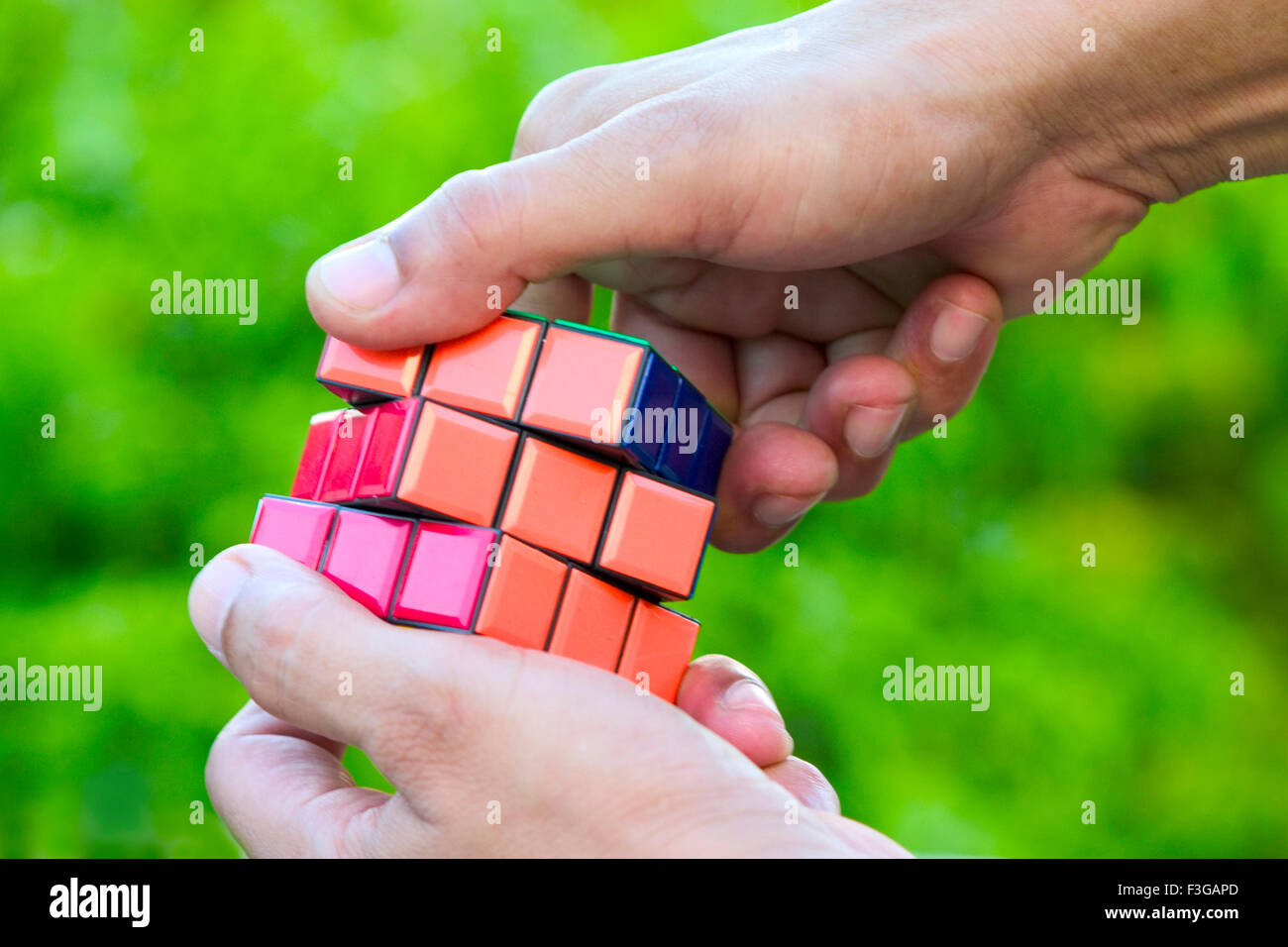 Concept ; Hand playing with Rubik puzzle cube game MR#201 Stock Photo ...