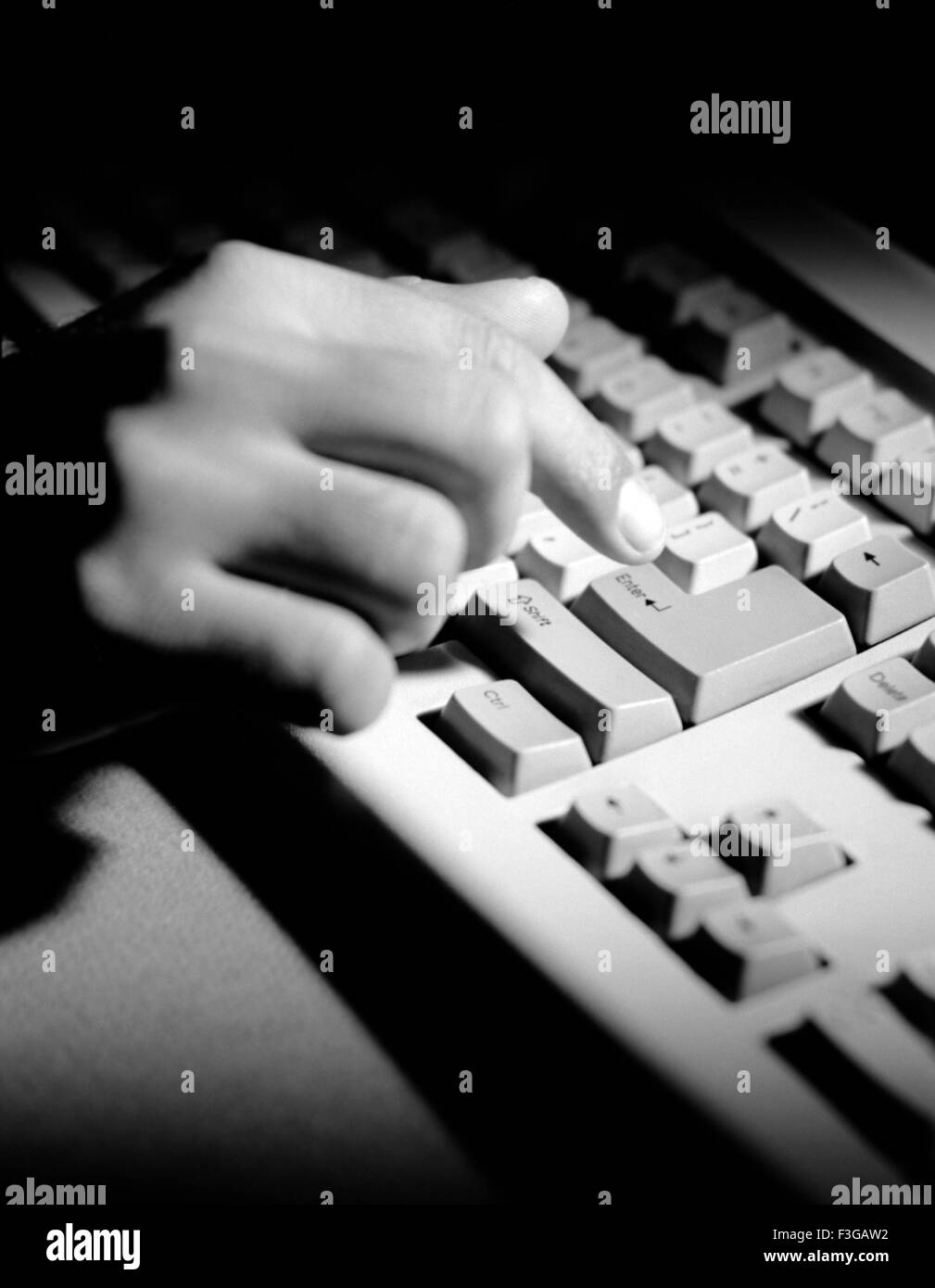 finger pressing enter Stock Photo - Alamy