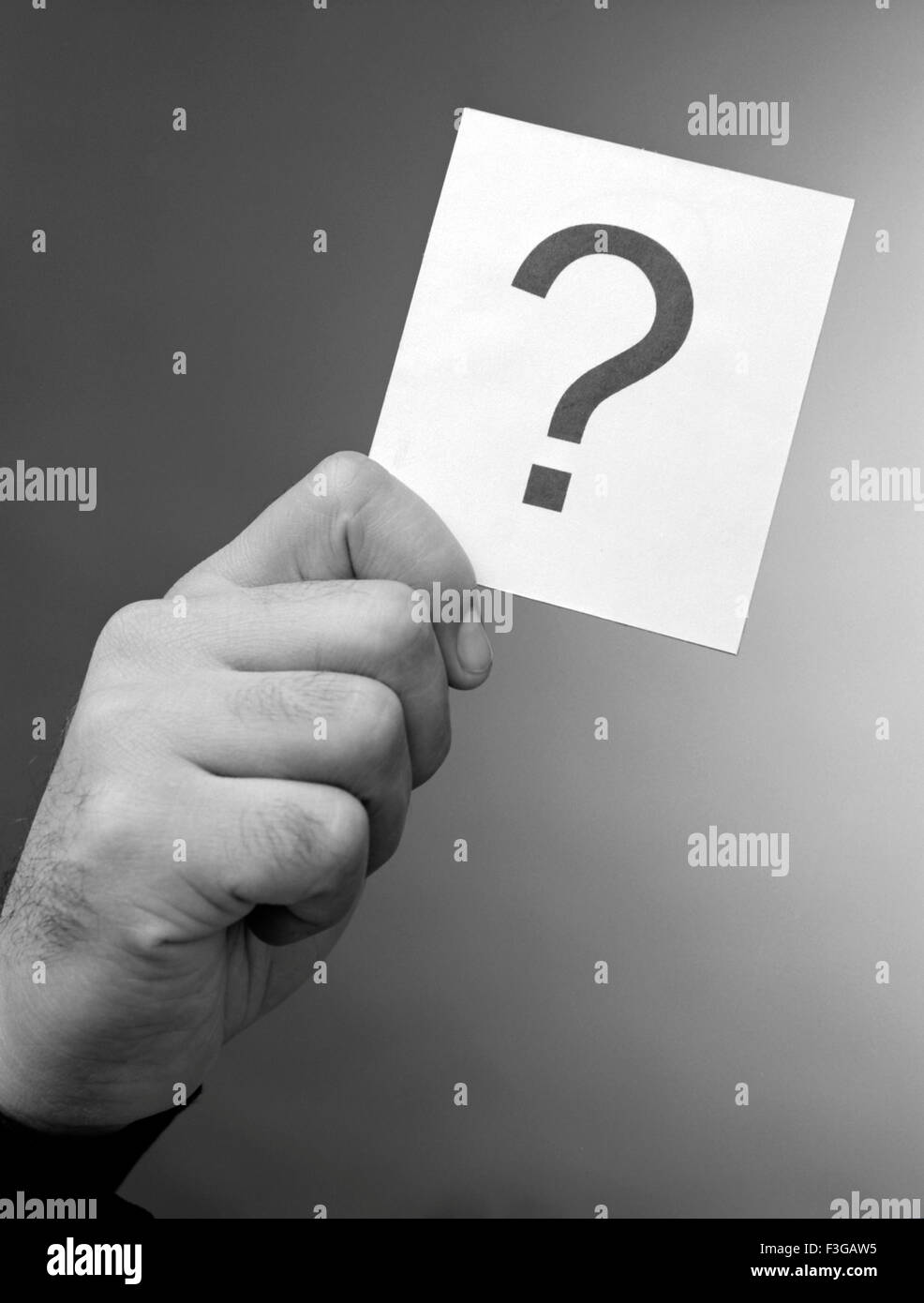 Hand & question mark Stock Photo - Alamy