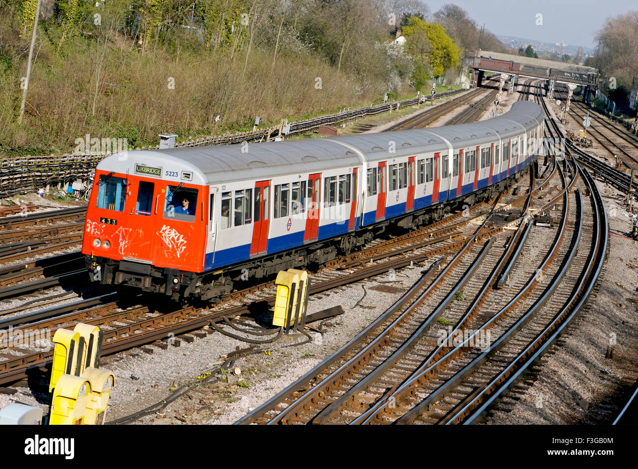 Tube train on tracks ; London ; U.K. United Kingdom England Stock Photo ...