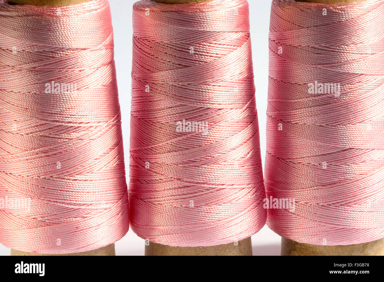 Concept ; three cylindrical shape crochet silky shiny pink Color thread ...