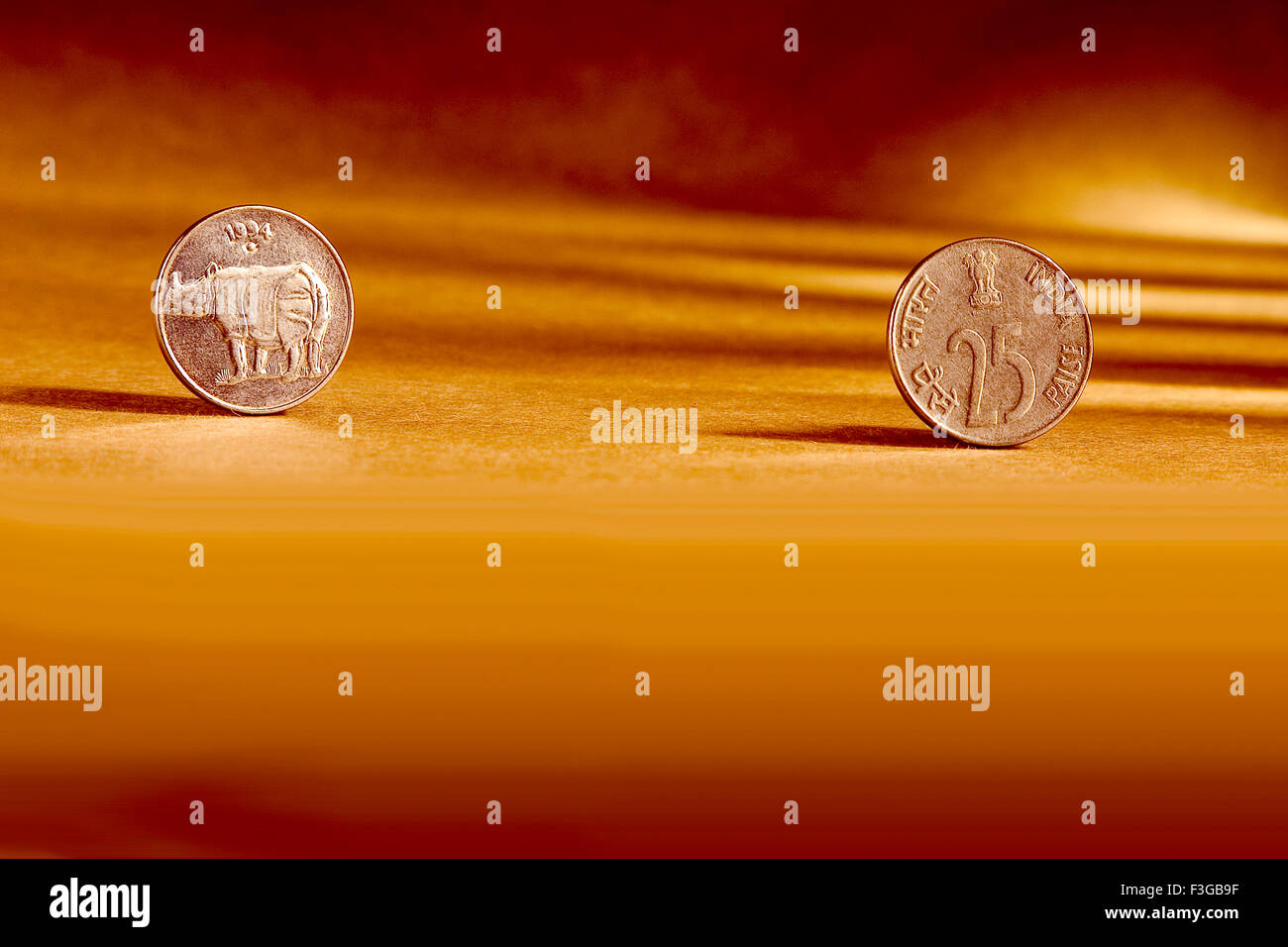 Double pair Indian currency twenty five paise coin front side and ...