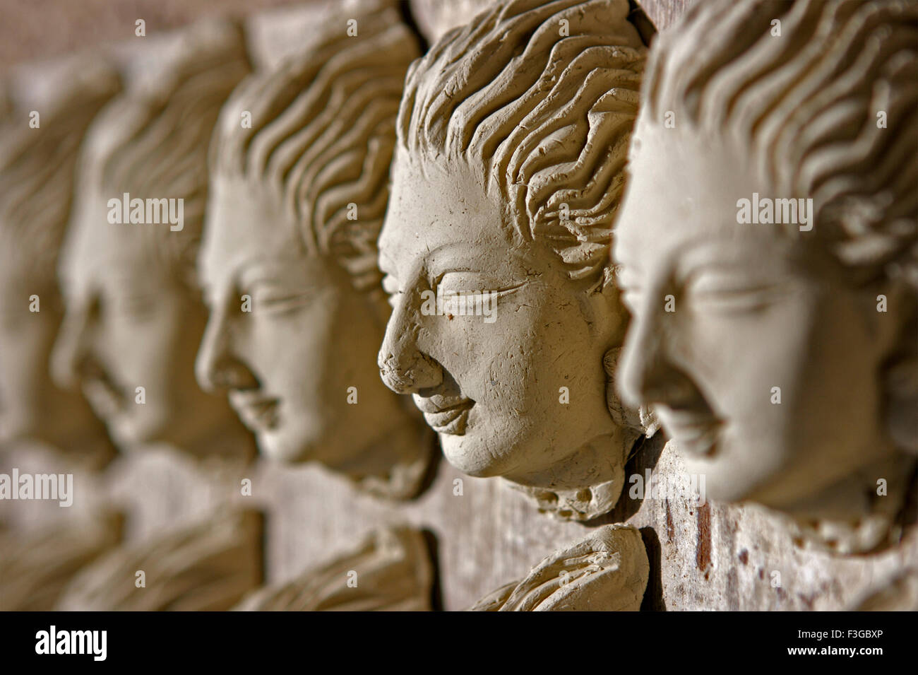 Male human masks in clay for Durga Pooja Celebration ; Rajkot ; Gujarat ...
