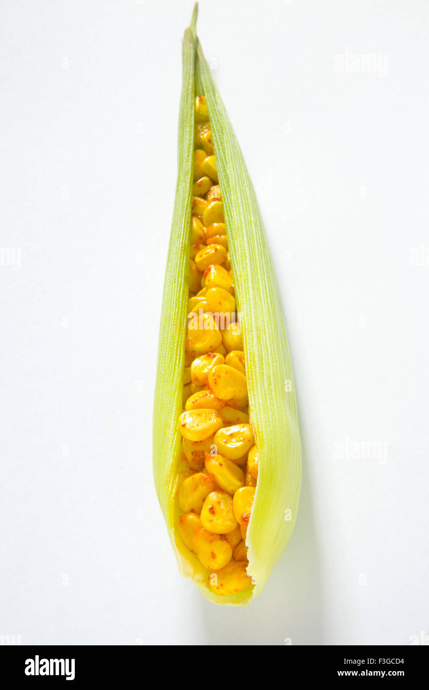 Food grain vegetable corn maize sweet and spicy in peel served on white ...