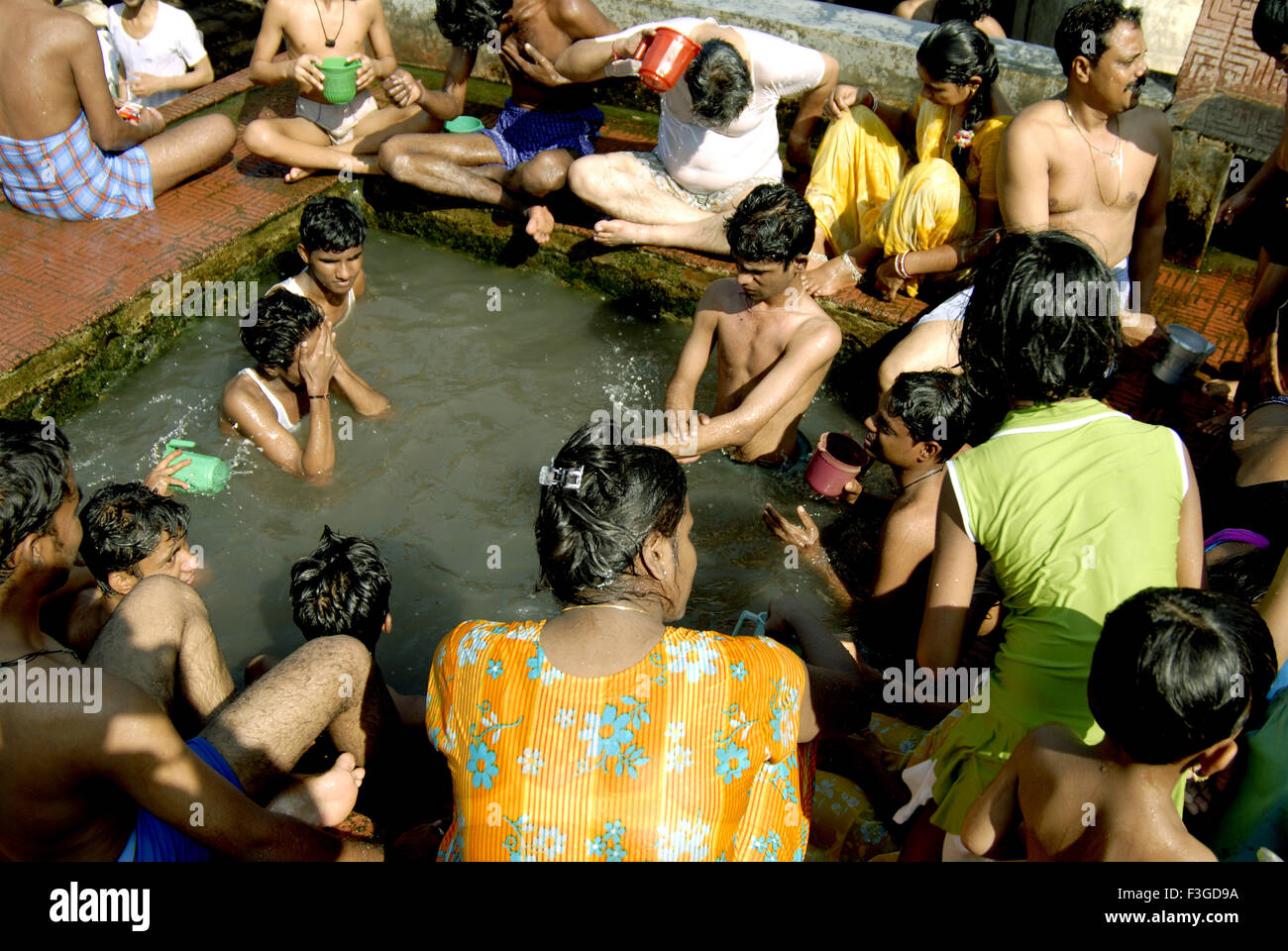 People bathing in hot water spring at Akloli near Vajreshwari Thane ...