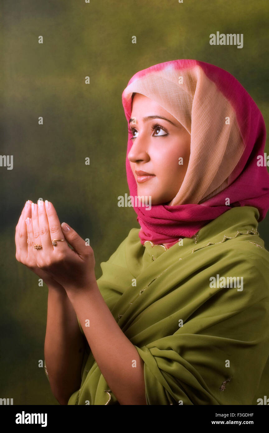 Woman praying wearing hijab, India, Asia, MR#690D Stock Photo - Alamy