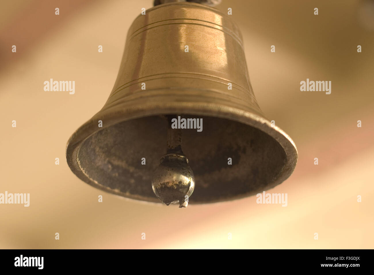 Hanging brass bell hi-res stock photography and images - Alamy