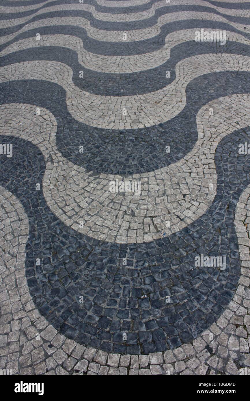 Wave cobblestone artistic pavement in Rossio Square in Lisbon, close up ...