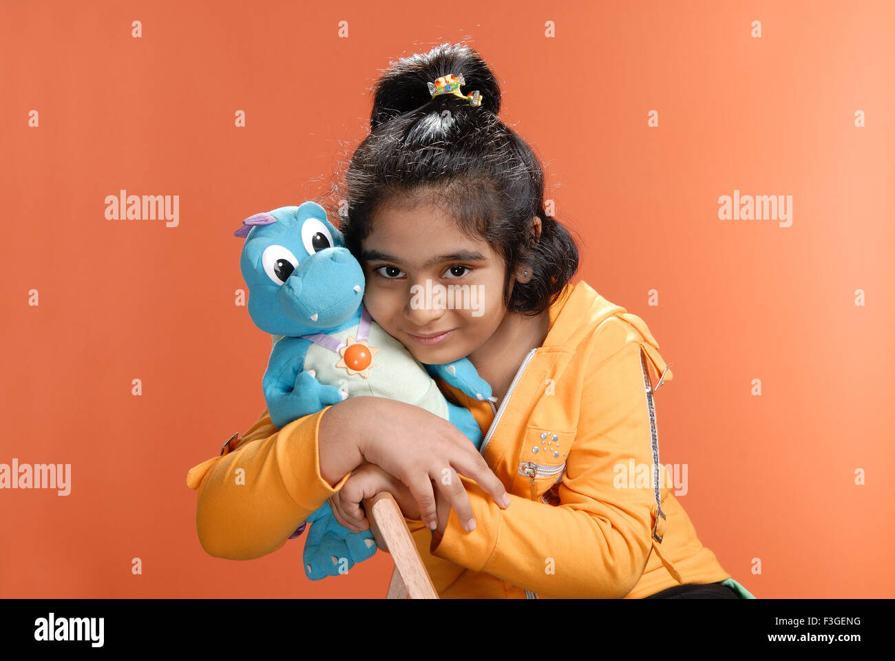Girl hugging soft toy, MR#719B Stock Photo - Alamy