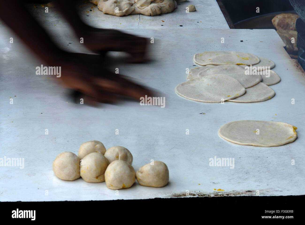 Indian food ; roti or chapatti made of maida flour preparing ; Bombay ...