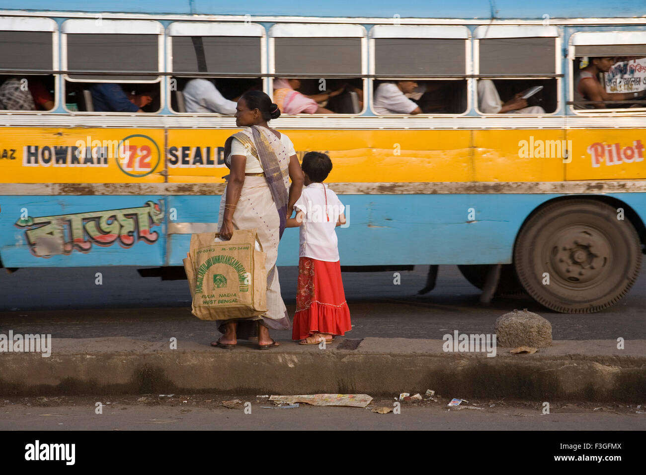 Street Scene ; local transportation ; Calcutta ; West Bengal ; India ...