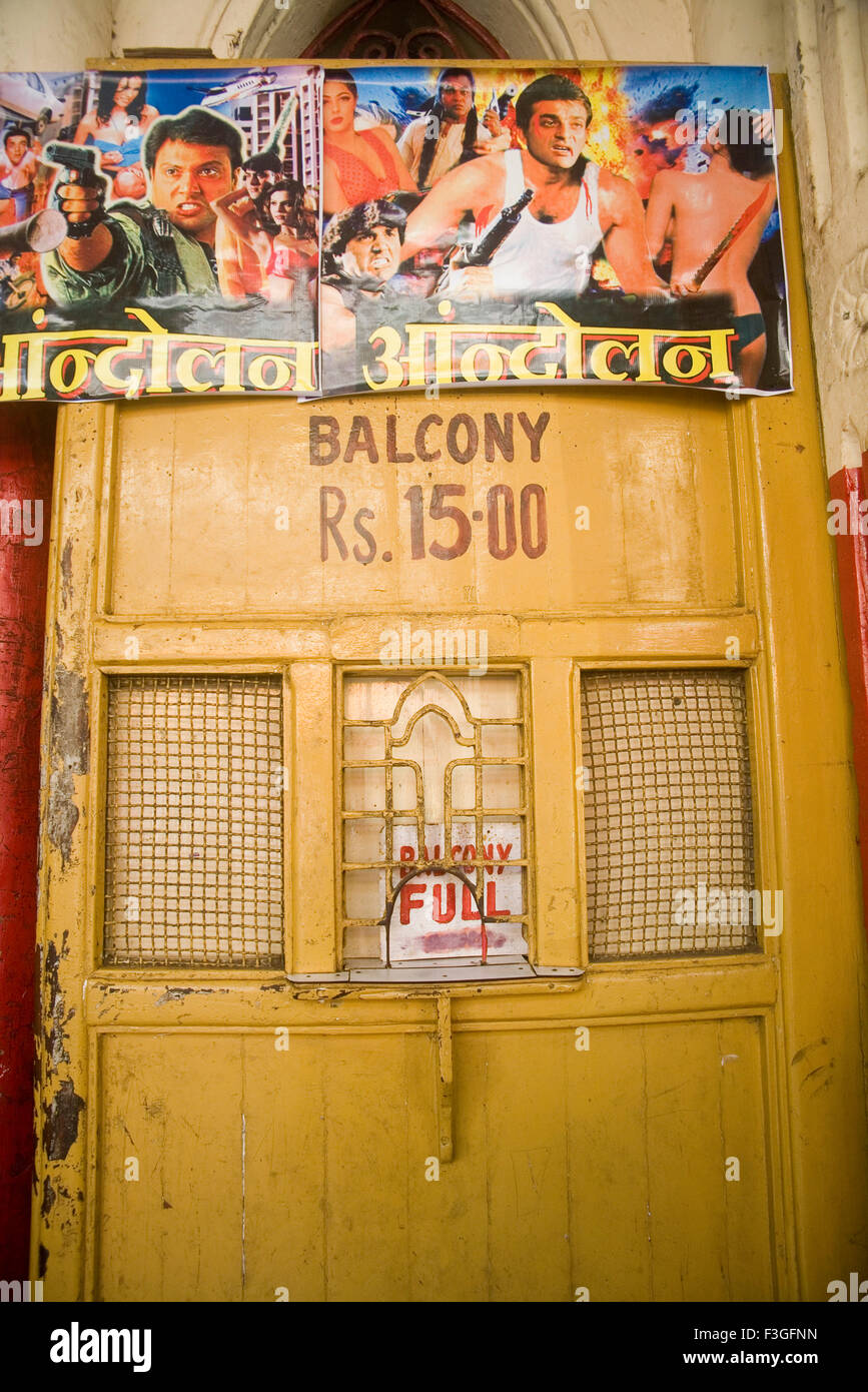 Balcony house full sign of cinema hall ; yellow window of the ticket ...