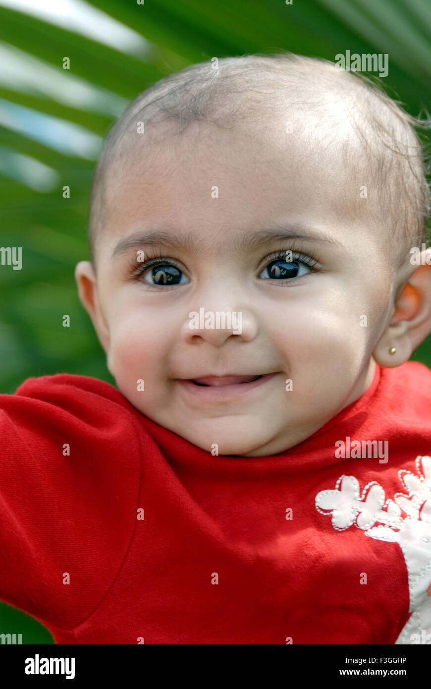 Asian baby playing red green hi-res stock photography and images - Alamy