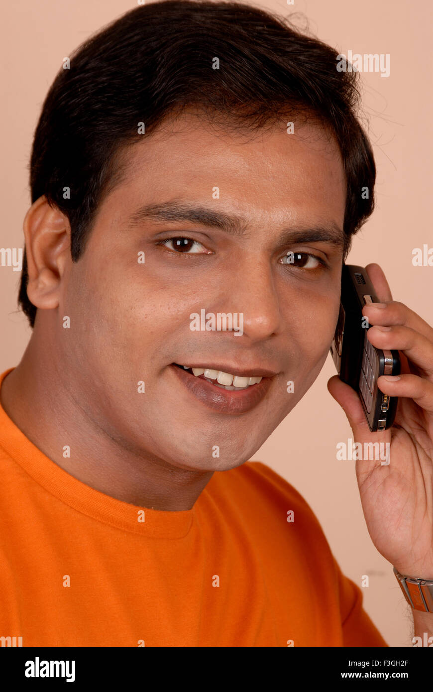 Indian urban man talking on mobile phone India MR#364 Stock Photo - Alamy