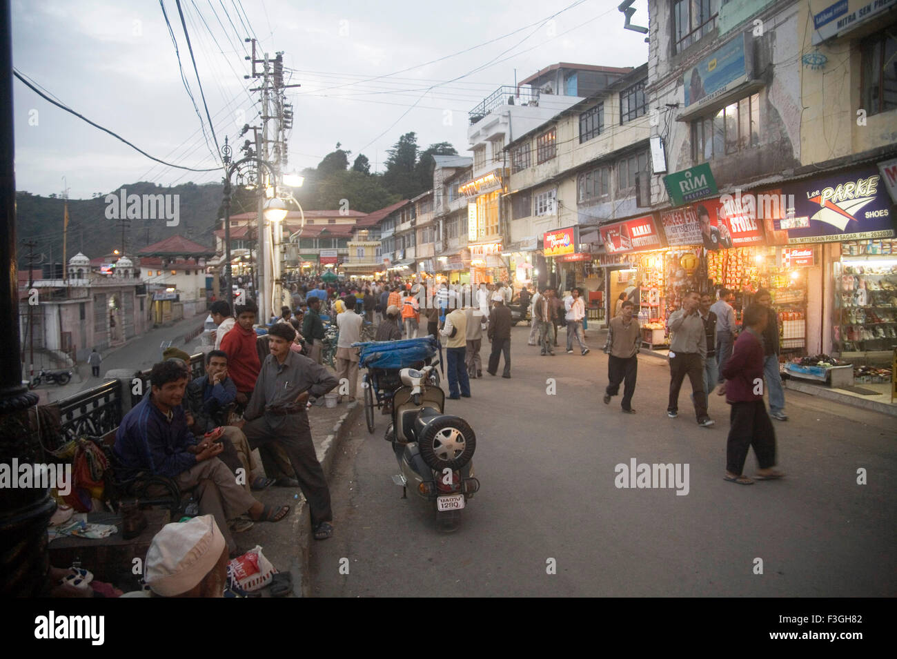 Street scene of market road crowded in evening light ; Mussoorie ...