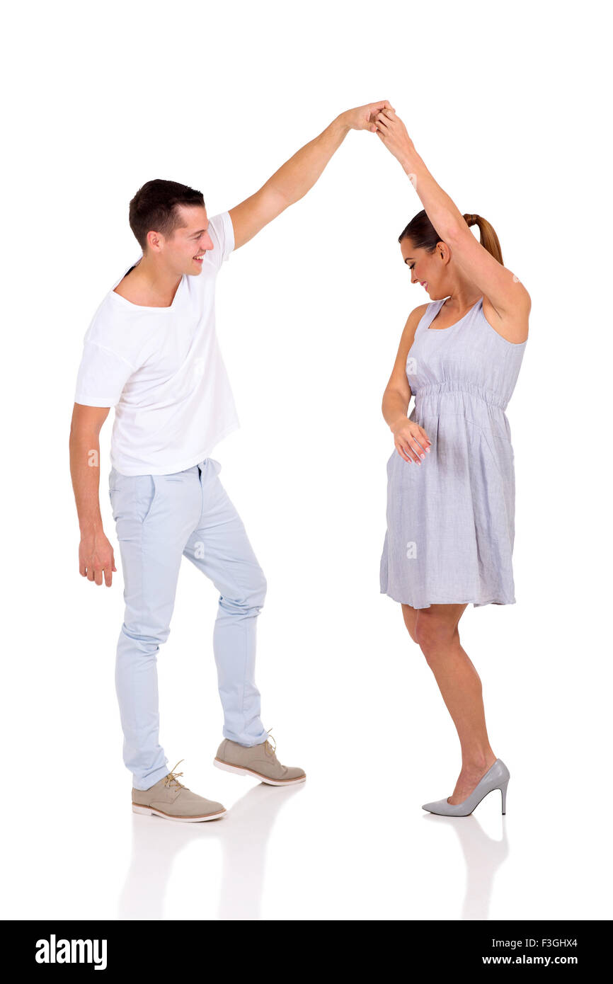 lovely young couple dancing on white background Stock Photo - Alamy